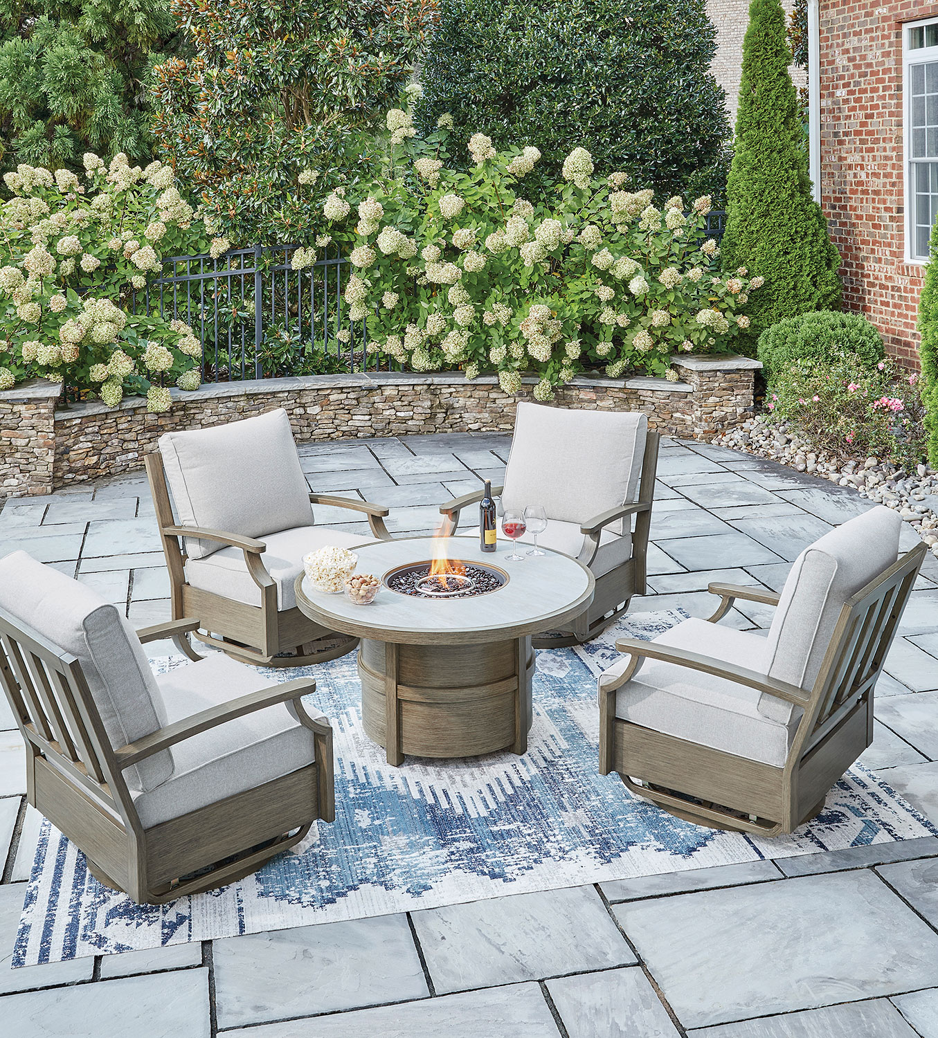 Rainier Ranch Outdoor Fire Pit Set Signature Design | Furniture Cart