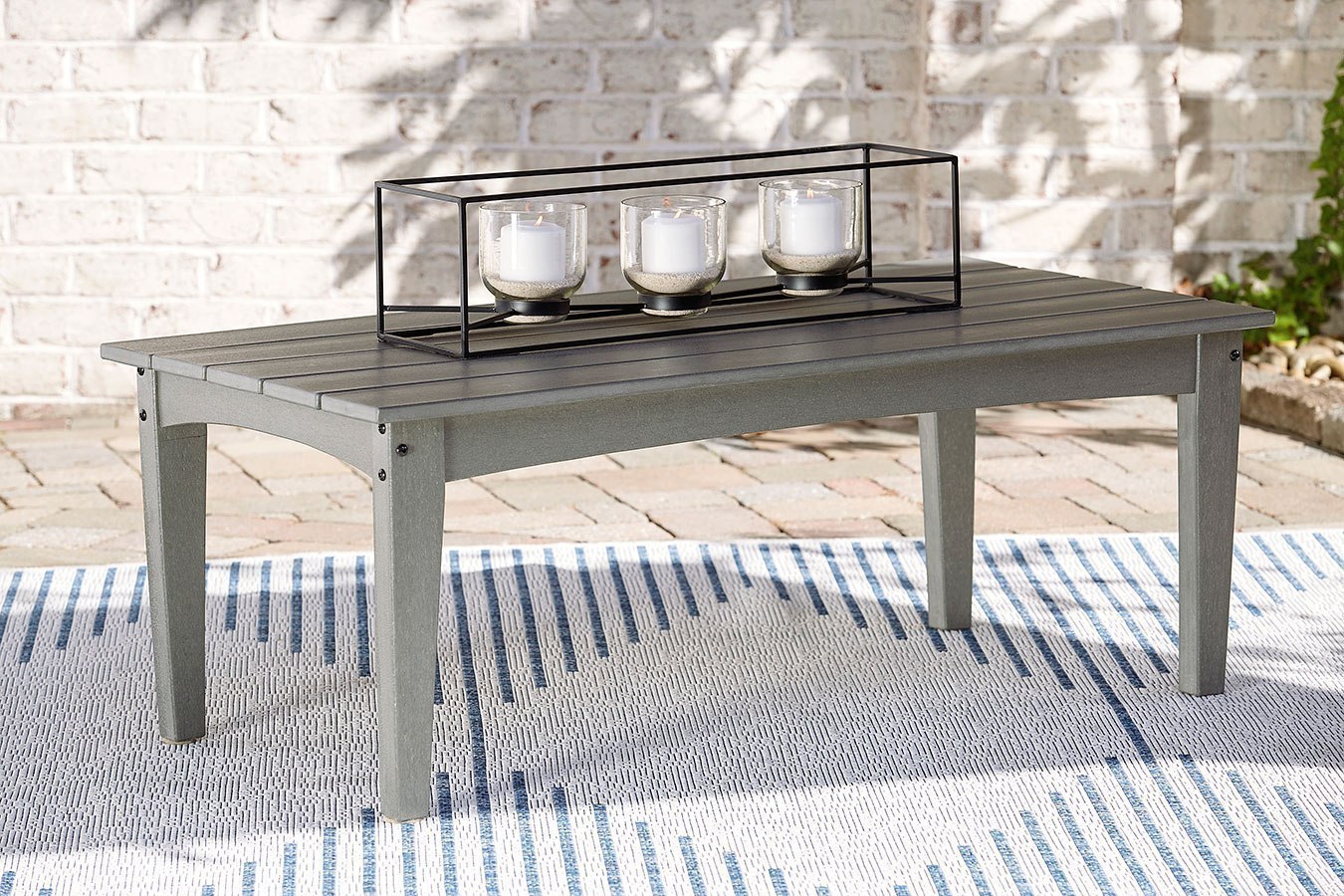 Visola Outdoor Cocktail Table Signature Design | Furniture Cart